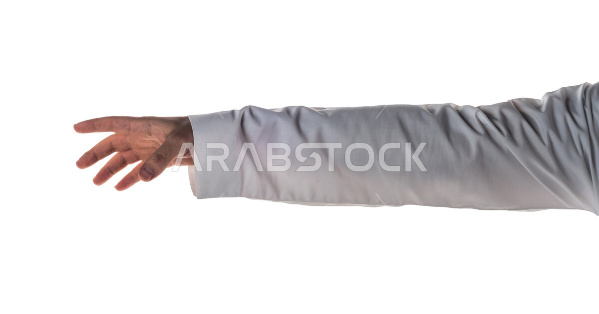 Portrait of a Saudi Gulf man wearing traditional Gulf clothing, making ...