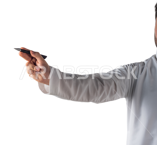 Portrait of a Saudi Gulf man wearing traditional Gulf dress holding a ...