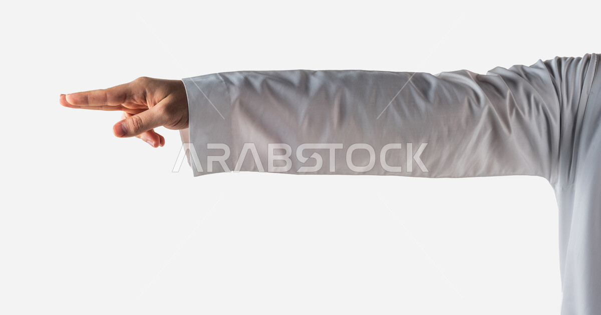 Portrait of a Saudi Gulf man wearing traditional Gulf clothing, making ...