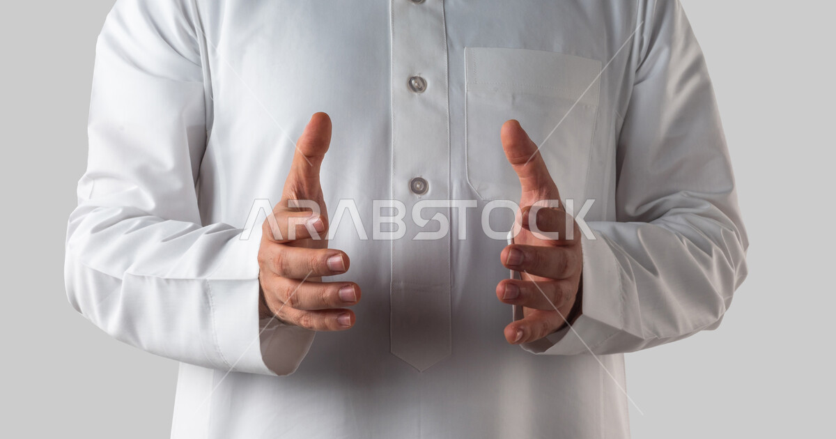 Portrait of a Saudi Arabian Gulf man with different hand gestures ...