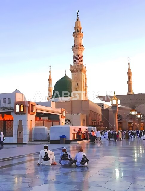 Muslims sitting in the outer complex of the Prophet's Mosque in Medina ...