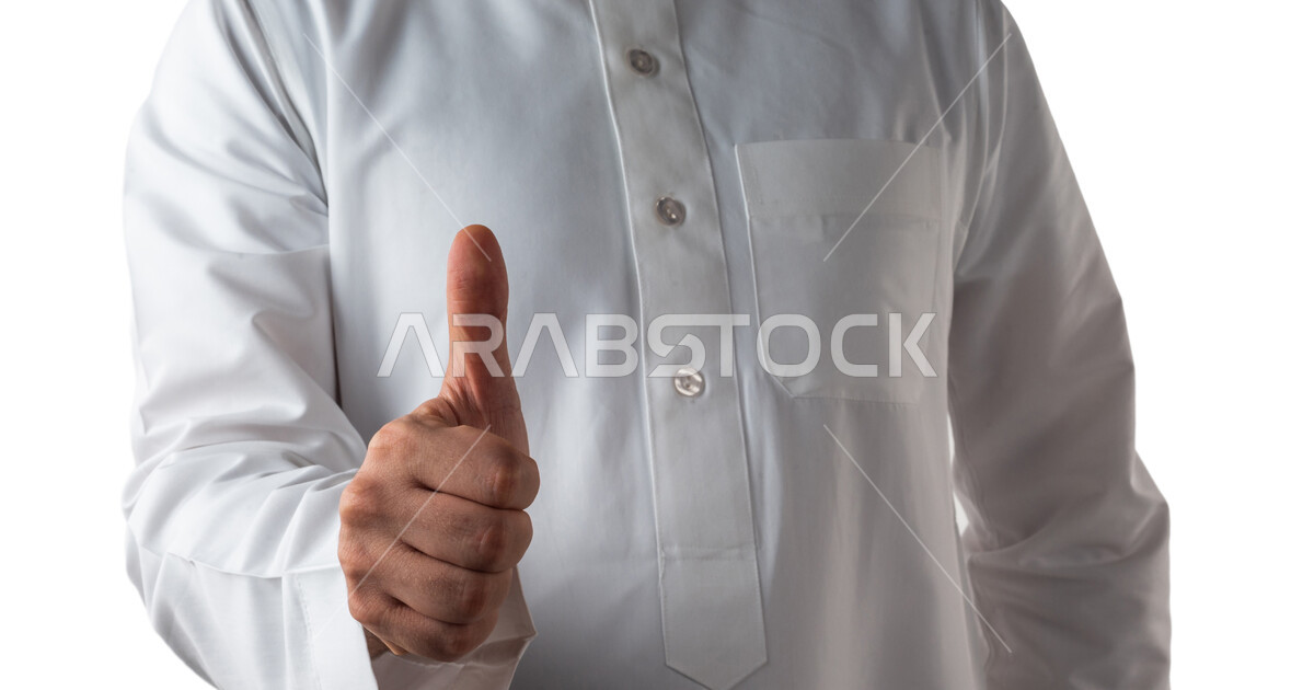 Portrait of a Saudi Gulf man in traditional Gulf dress making different ...