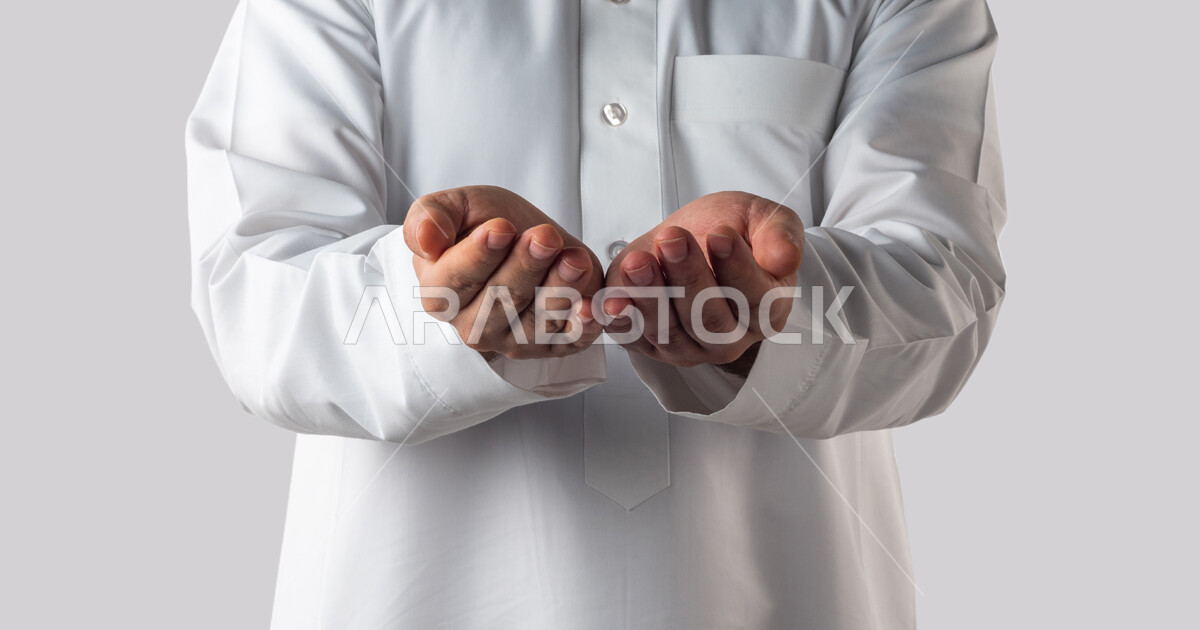 Portrait of a Saudi Gulf man making different hand gestures, opening ...