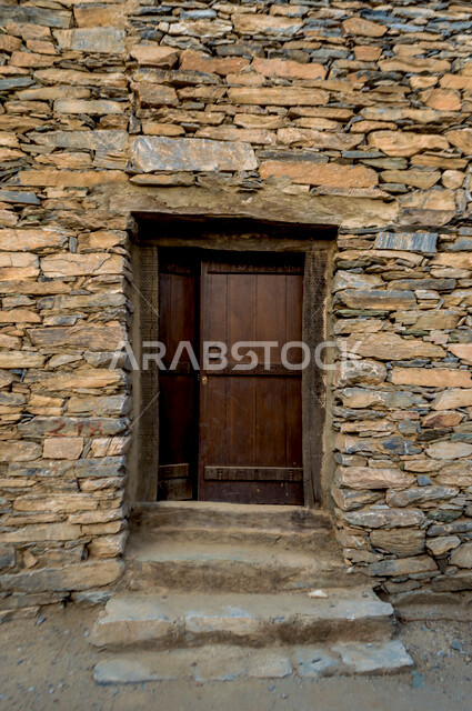 Rocky houses in the ancient stone village of Dhi Ain in the city of Al ...