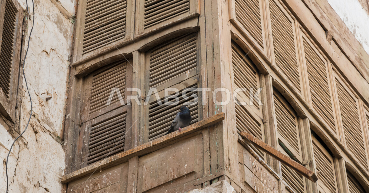 Historic antique wooden windows in the historical city of Jeddah with ...