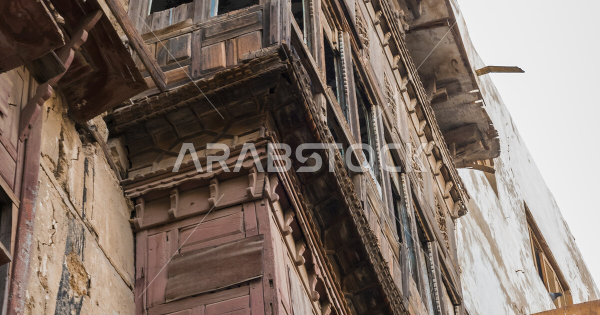 Historic antique wooden windows in the historical city of Jeddah with ...