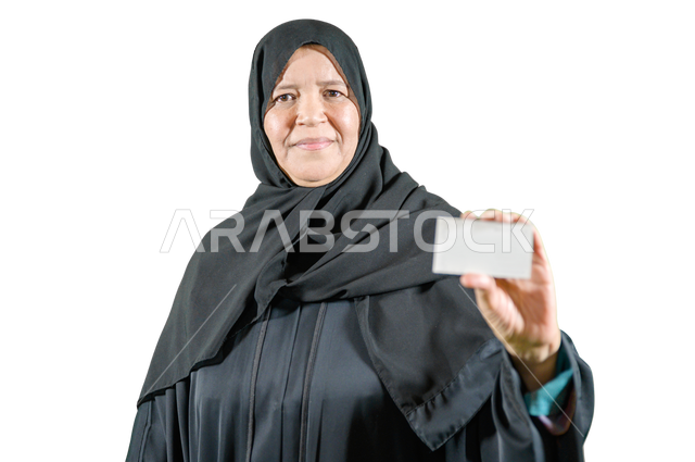 Portrait of an old Saudi Arabian Gulf woman, looking at the camera ...