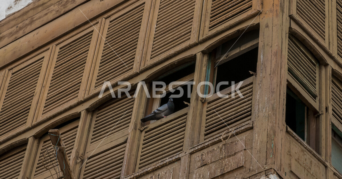 Historic antique wooden windows in the historical city of Jeddah with ...