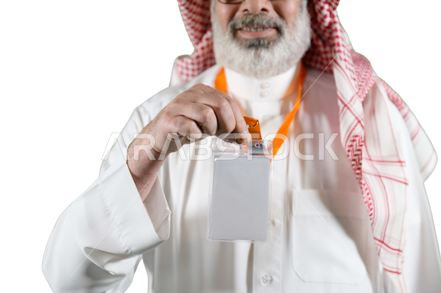 Portrait of an elderly Saudi Arabian Gulf Arab man in traditional Gulf ...