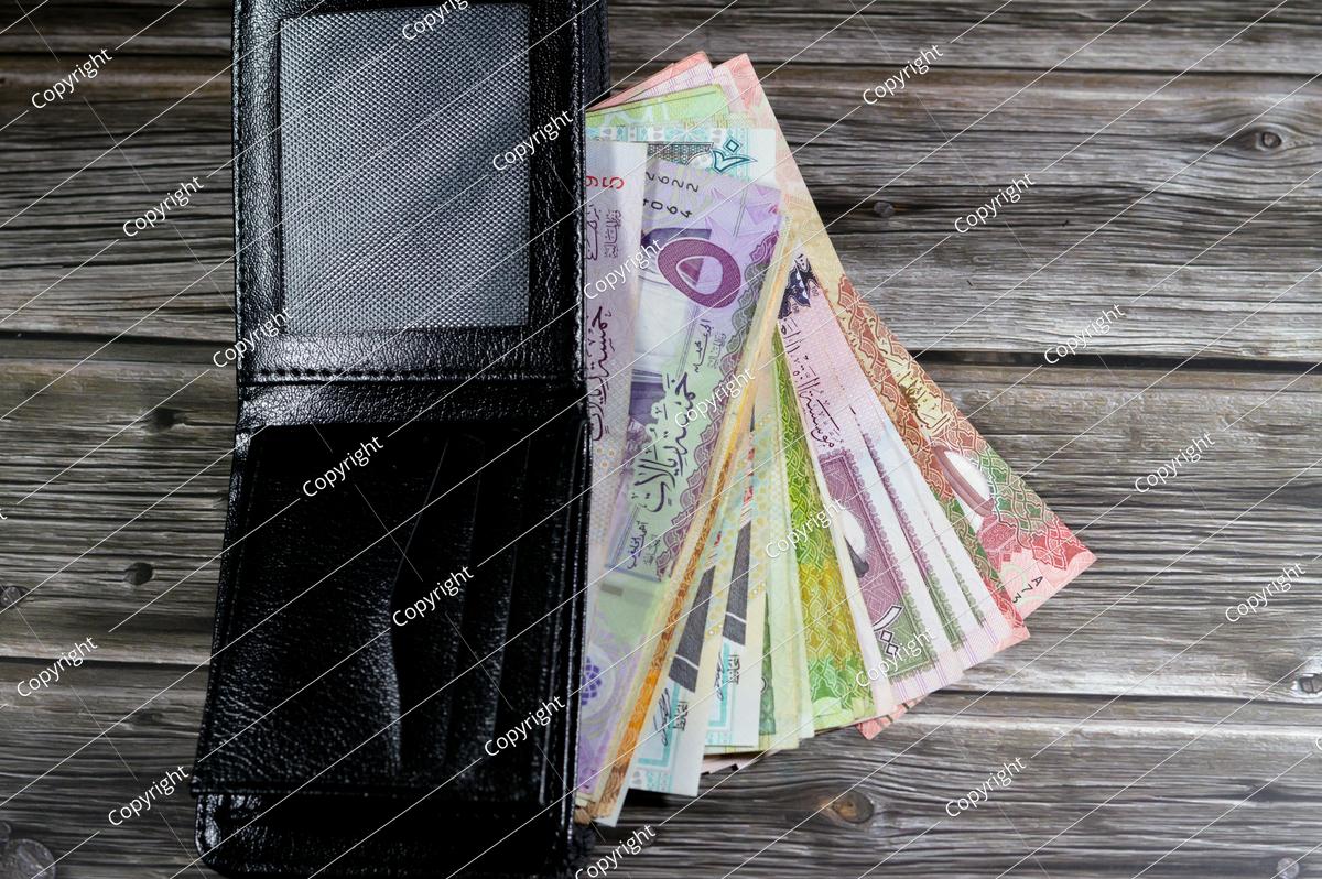 Saudi Arabian Riyals bills banknotes, pile of SAR riyal cash money ...