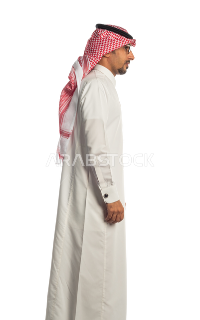 Portrait of a Saudi Arabian Gulf man doing a photo session, walking to ...