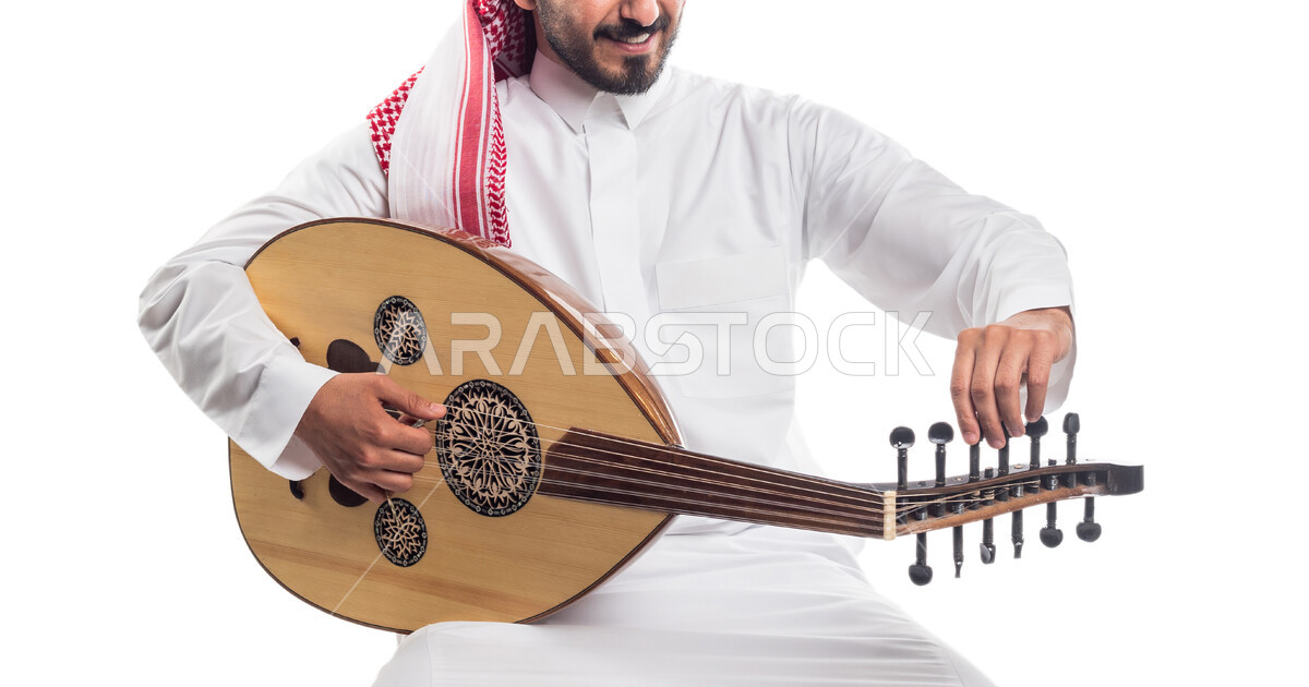 A picture of a Saudi Arabian Gulf man playing the oud, musical ...