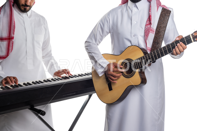 An Arab Saudi Gulf band that has artistic talents, playing the guitar ...