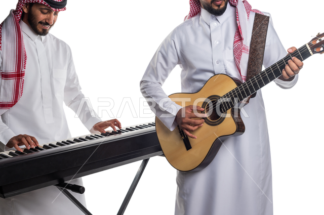 An Arab Saudi Gulf band that has artistic talents, playing the guitar ...