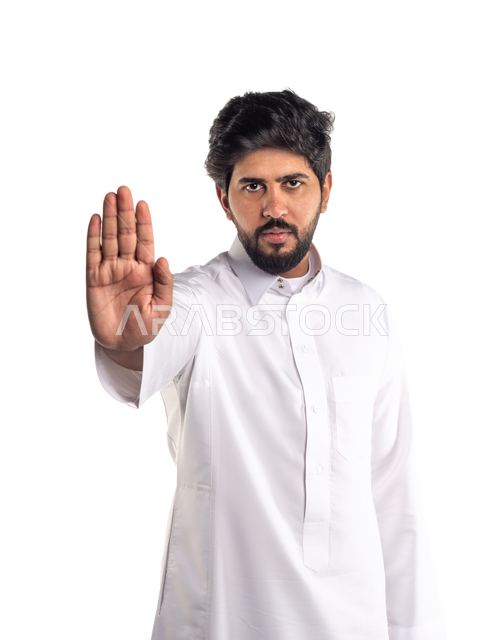 Portrait of a Saudi Arabian Gulf youth taking a photo session, angry ...