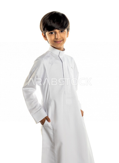 Portrait of a happy Saudi Arabian Gulf child wearing traditional ...
