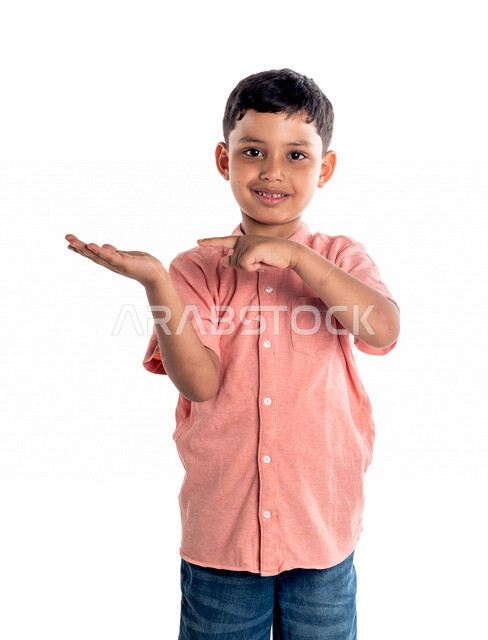 Portrait of a Saudi Arabian Gulf boy making different hand gestures ...