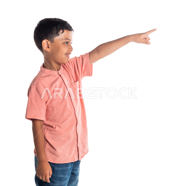 Portrait of a Saudi Arabian Gulf boy pointing with the index finger at ...