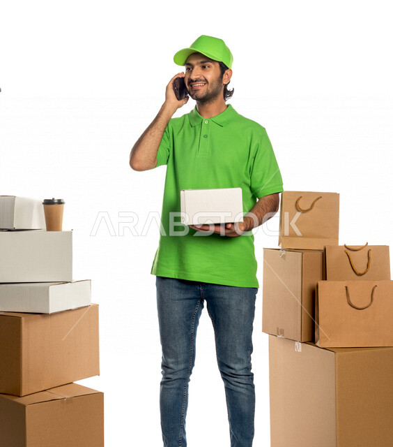 Portrait of a Saudi Arabian Gulf man working in the delivery of orders ...
