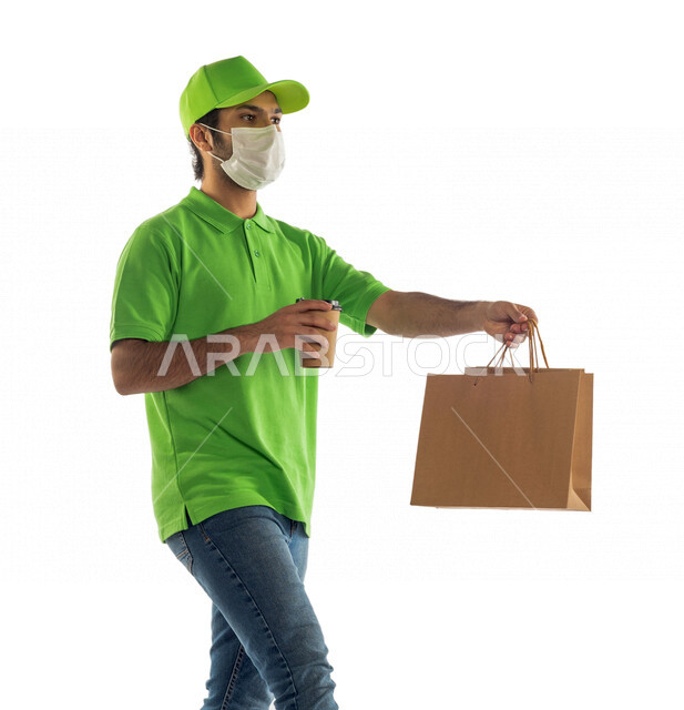 Portrait of a Saudi Arabian Gulf man working in the delivery of orders ...