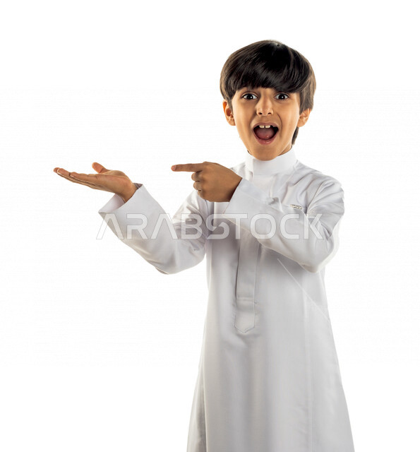 Portrait of a Saudi Arabian Gulf boy making different hand gestures ...