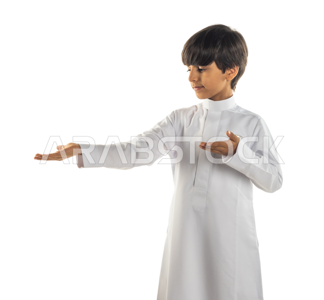 Portrait of a Saudi Arabian Gulf boy making different hand gestures and ...