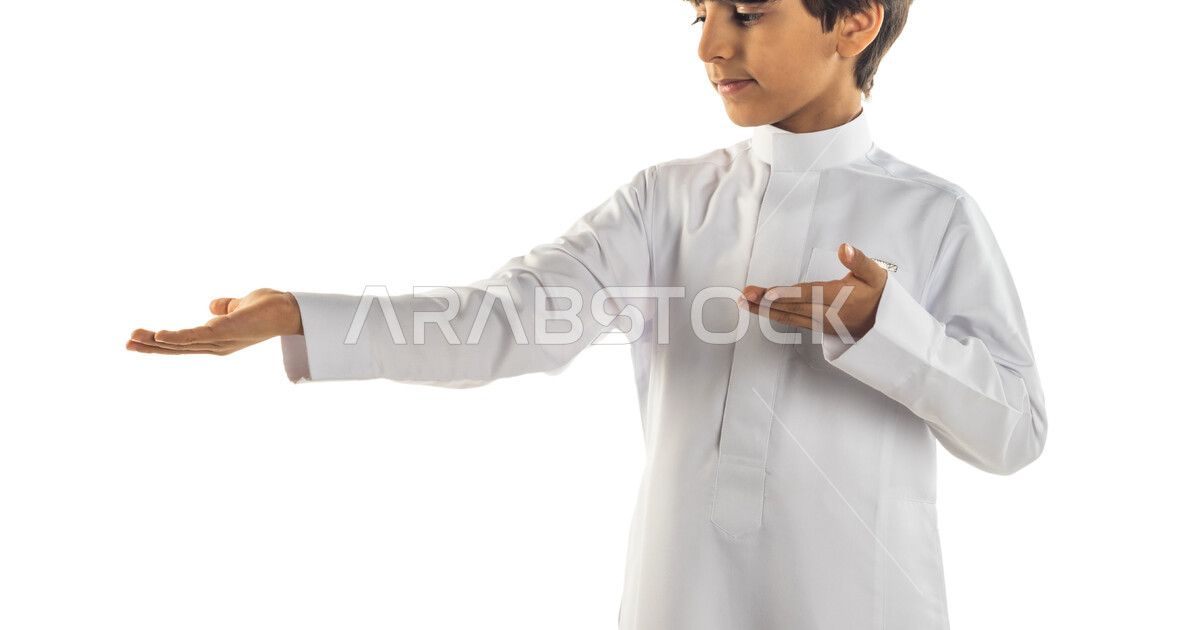 Portrait of a Saudi Arabian Gulf boy making different hand gestures and ...
