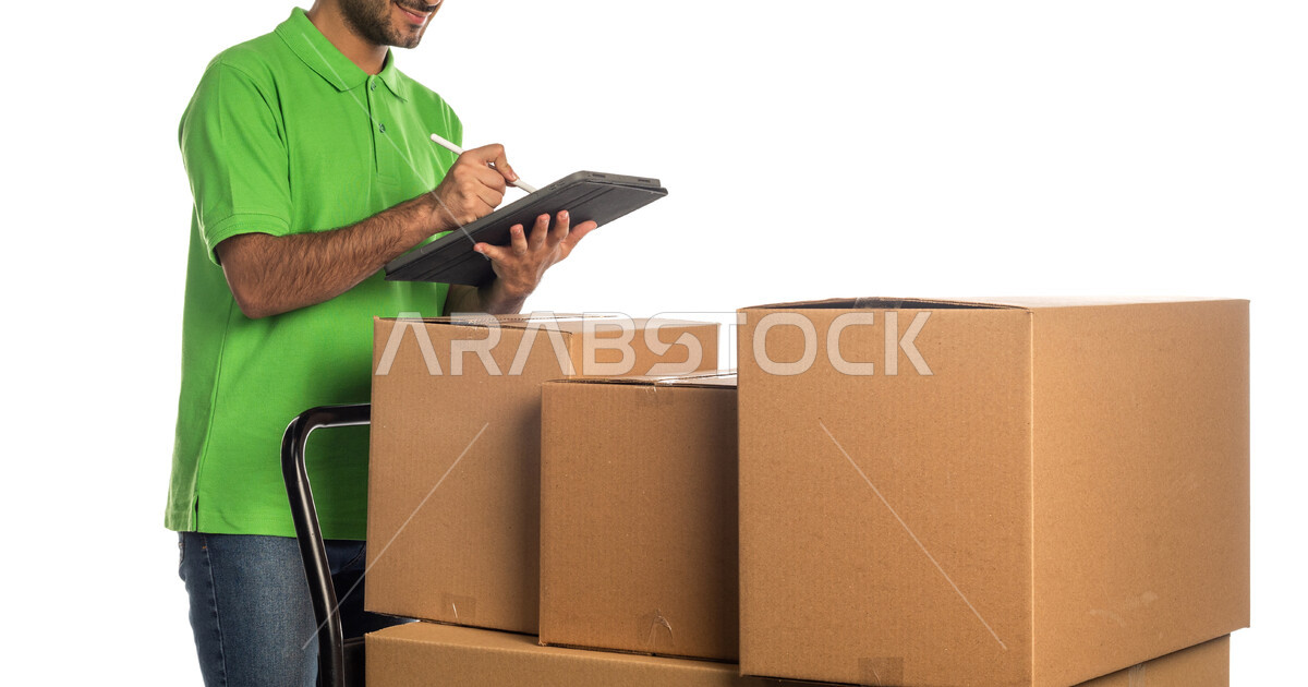 Portrait of a Saudi Arabian Gulf man working in the delivery of orders ...