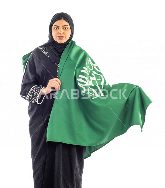 Portrait of a Saudi Arabian Gulf woman putting the flag of the Kingdom ...