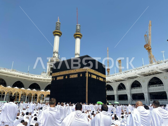 Circumambulating the Kaaba in Mecca, pilgrims to the House of God in ...