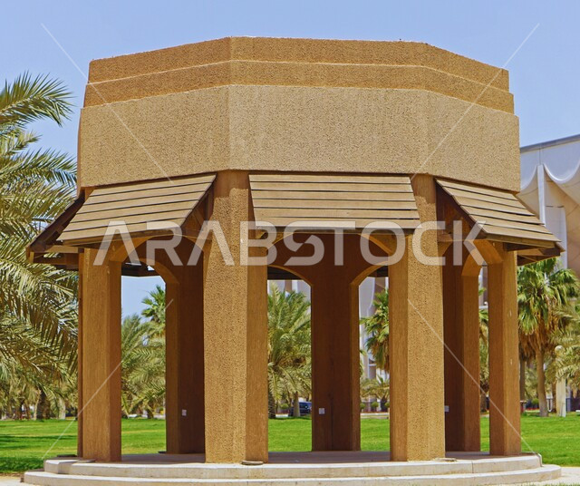 A canopy made of clay in Al-Shaab Park in Kuwait City, a view of green ...