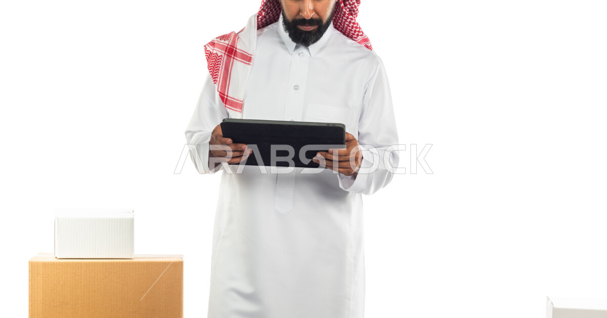 Portrait of a Saudi Arabian Gulf man working in the delivery of orders ...