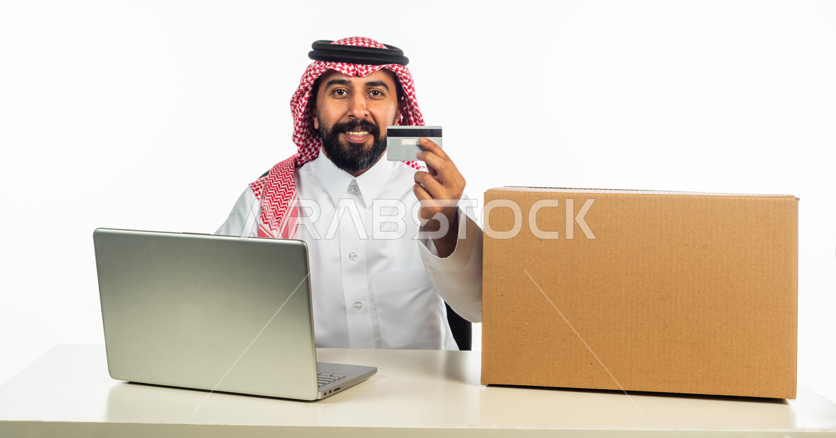 A Saudi Arabian Gulf employee working in a shipping and delivery ...