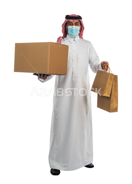 Portrait of a Saudi Arabian Gulf man working in the delivery of orders ...