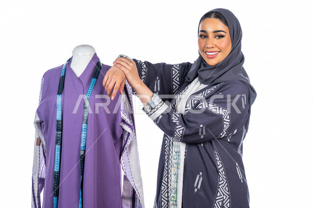 A portrait of a proud and smiling Saudi Arabian Gulf fashion designer ...