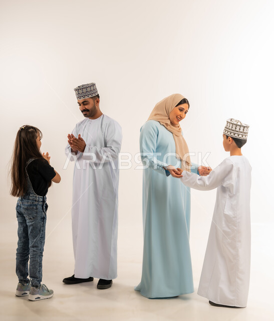 Omani family having a good time, concept of happy and close-knit family ...
