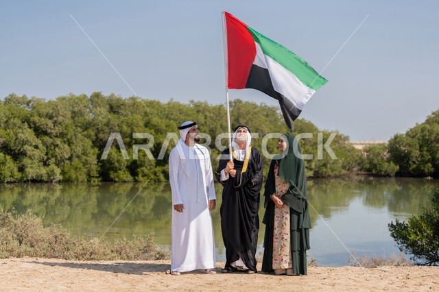 Wearing traditional folk costumes in remembrance of the UAE National ...