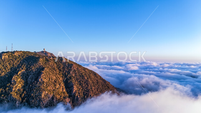 Al-Sawda Mountains peaks in Asir region during the day, view of thick ...
