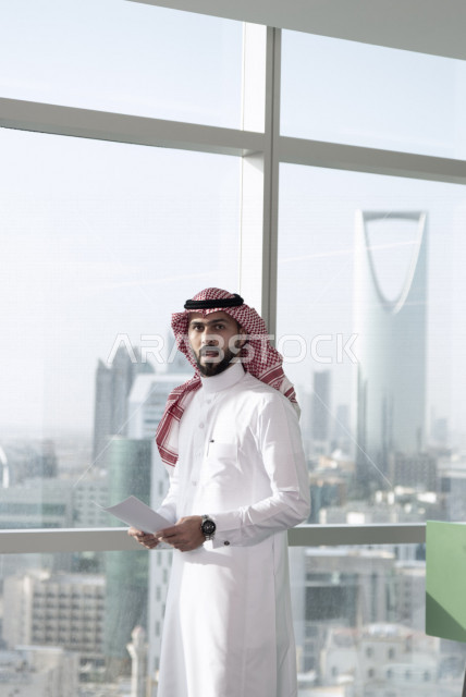 Saudi businessman in the company's headquarters, work environment ...