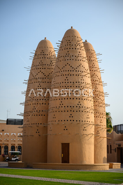 Ancient mud buildings, pigeon towers in Katara Cultural Village in Doha ...