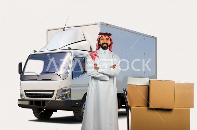 Portrait of a Saudi Arabian Gulf man dressed in Saudi dress working in ...