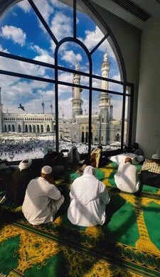 Clock tower overlooking the Kaaba, worship and drawing closer to the ...