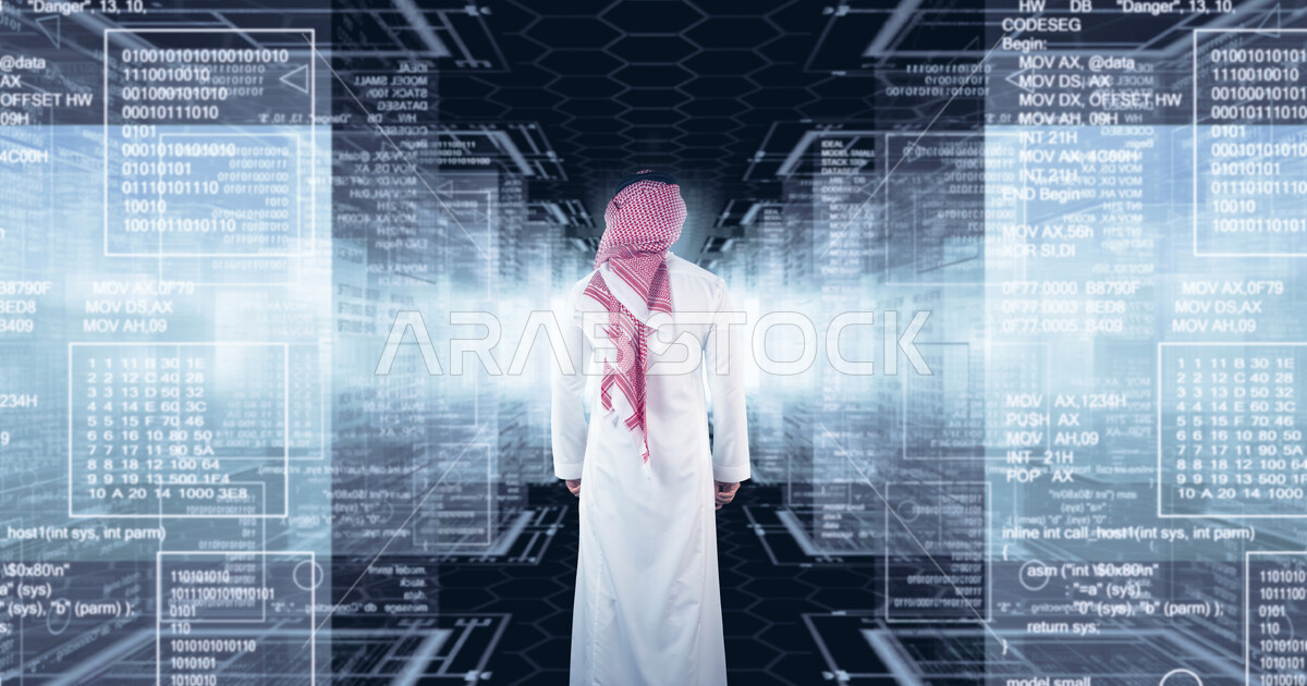 A young Saudi Arabian Gulf working as a web developer, using ...