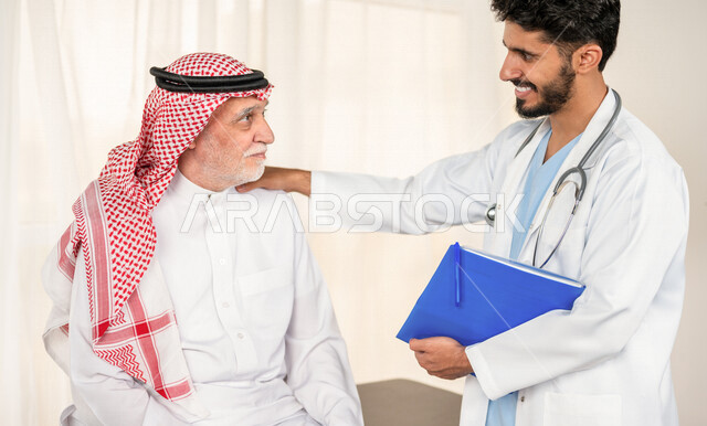 A Saudi Arabian Gulf family doctor who reassures an elderly patient ...