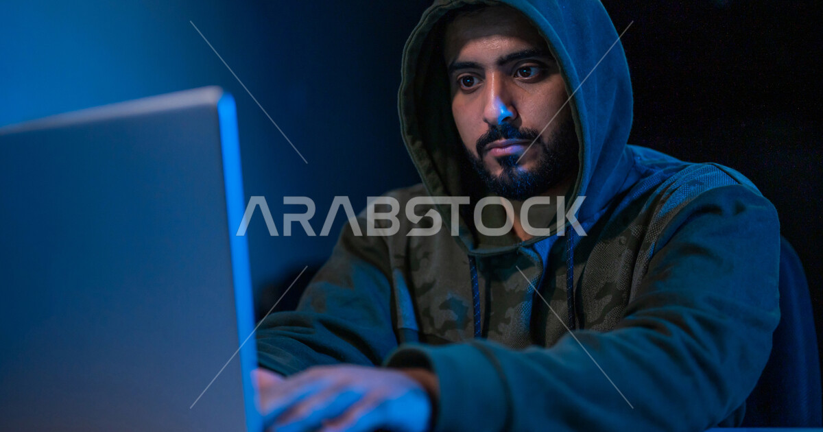 A Saudi Arabian Gulf youth, working in the field of illegal hacking ...