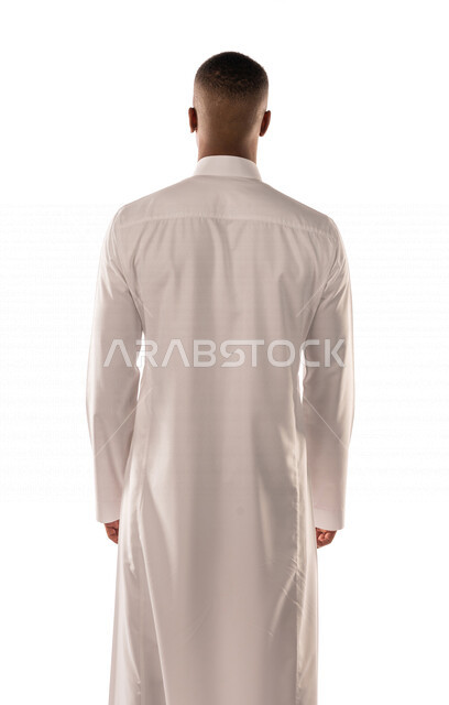 Portrait of a Saudi Arabian Gulf youth, back view of a Saudi young man ...