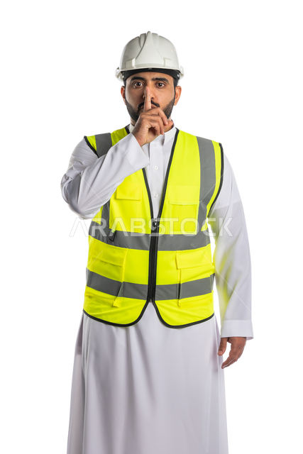 Portrait of a Saudi Arabian Gulf engineer wearing a helmet and work ...