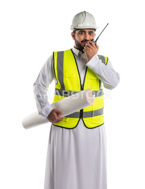 Portrait of a Saudi Arabian Gulf engineer wearing a work helmet and ...