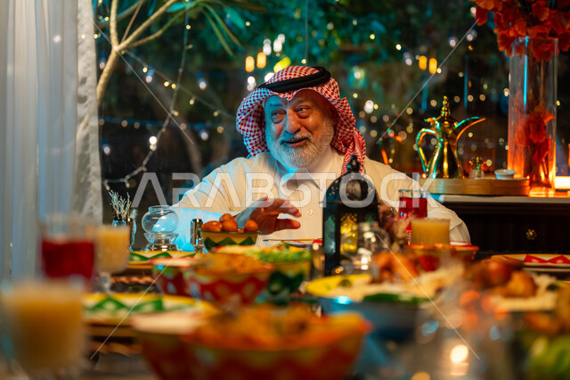 Eating Ramadan breakfast at sunset, expressions of happiness and joy at ...