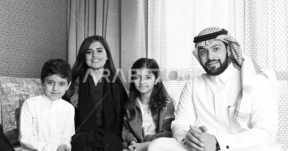 A black and white picture of a happy and smiling Saudi Gulf Arab family ...